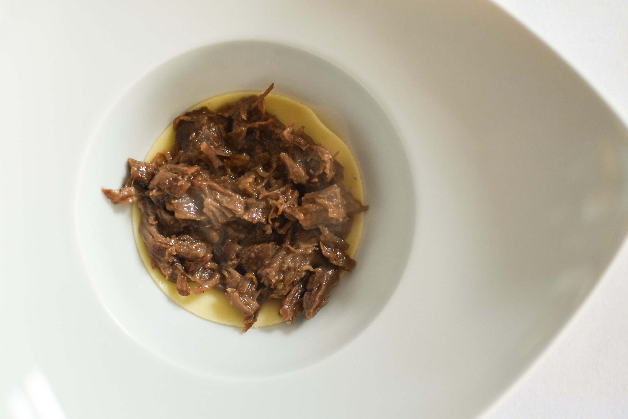 Open ravioli van varkenswang en bospaddenstoelen – Kris Kookt